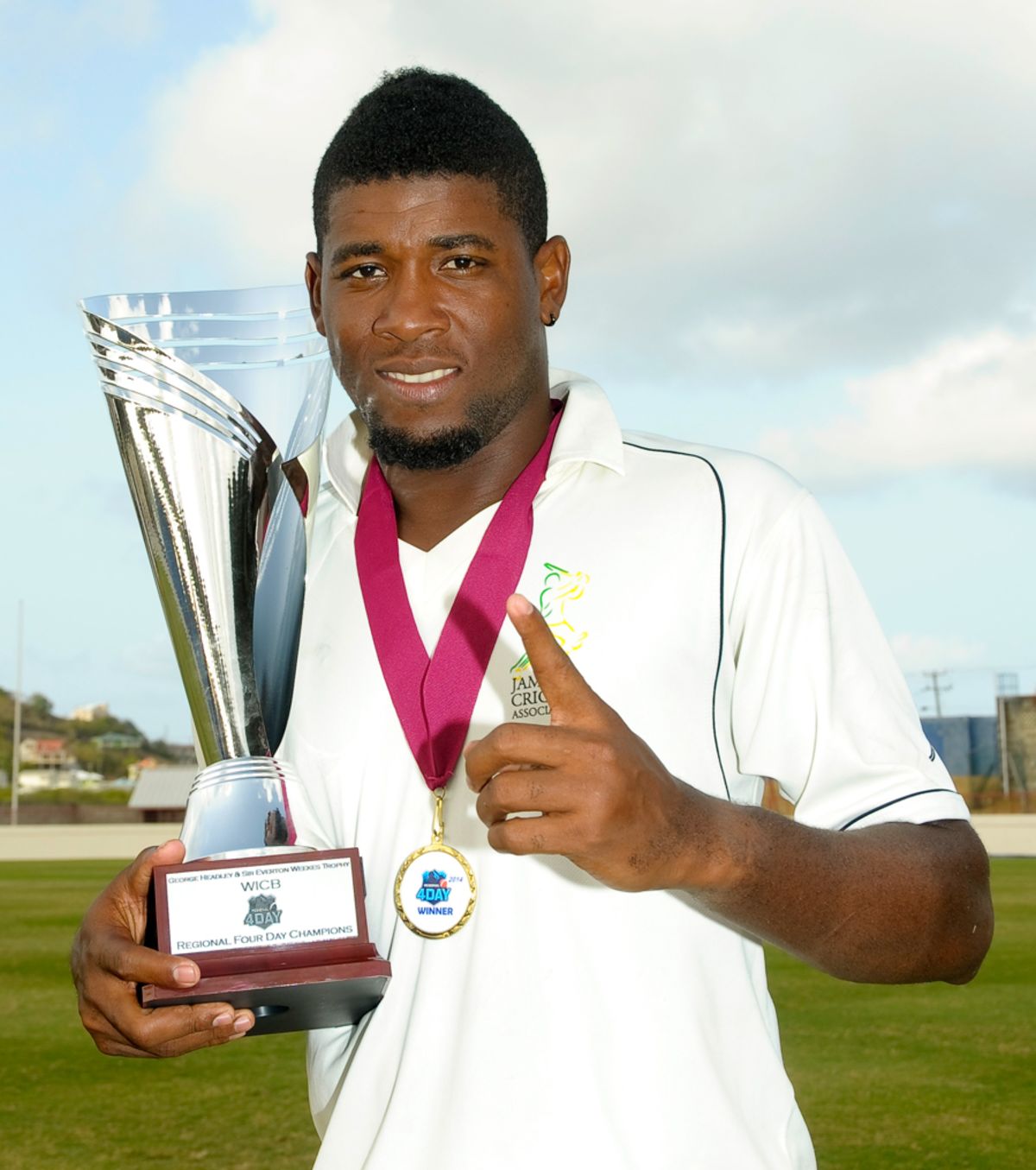 New signing Kumar Sangakkara poses with a Durham shirt | ESPNcricinfo.com