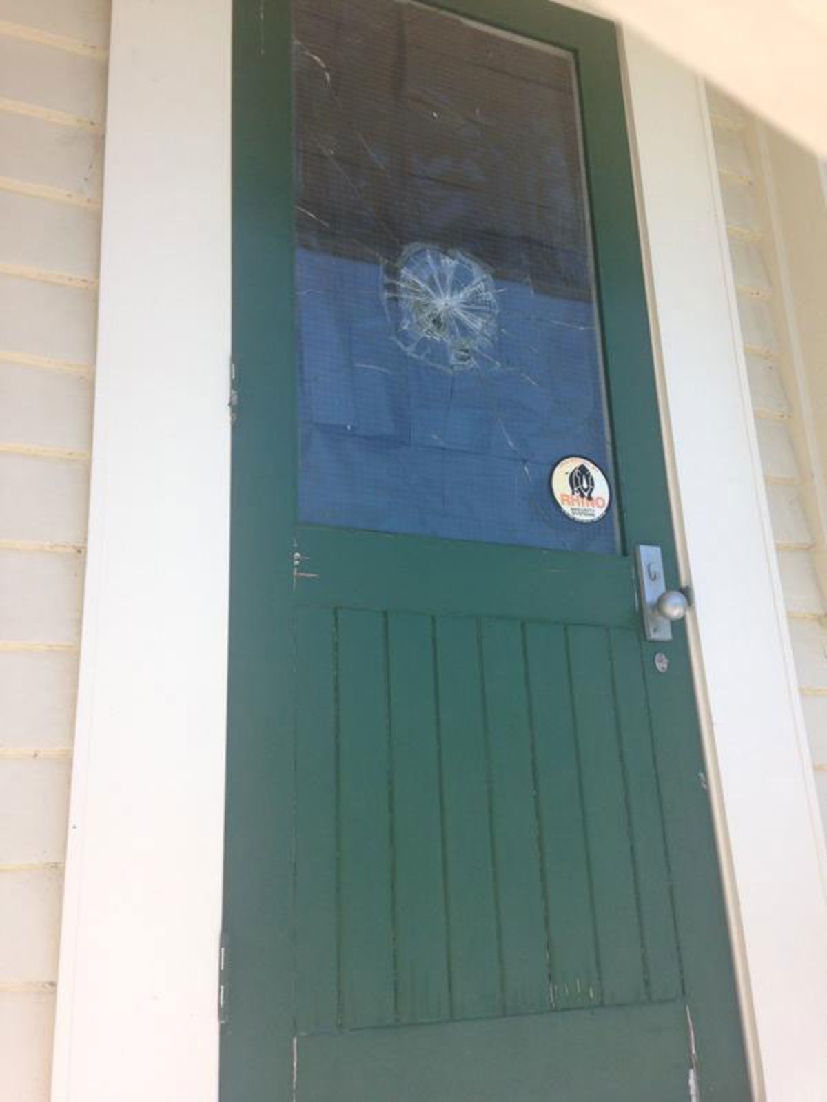 The smashed window pane at the bottom of the Merv Wallace Stand was ...