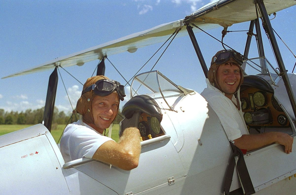 David Gower and John Morris pose after buzzing the ground at Cararra ...