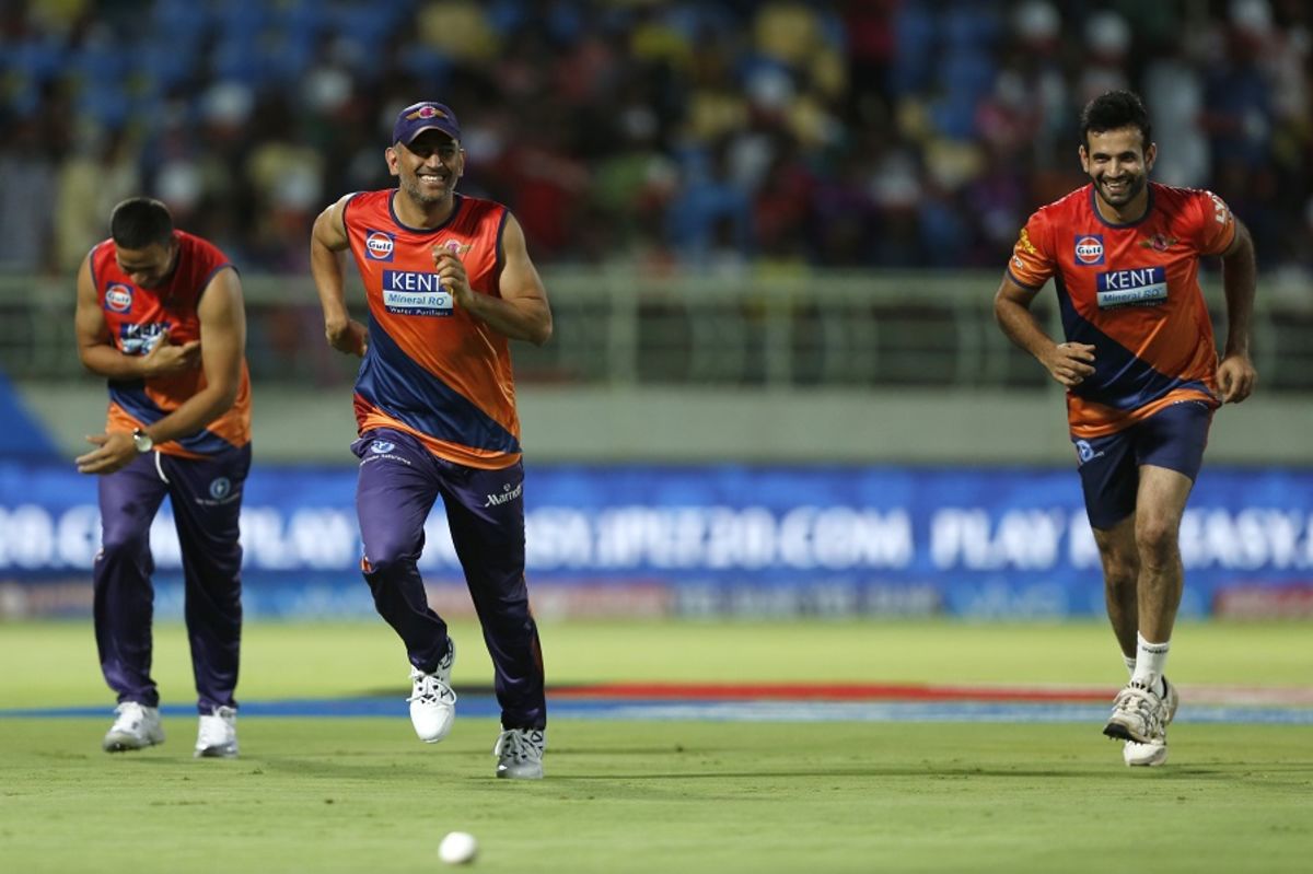 Usman Khawaja, MS Dhoni and Irfan Pathan share a laugh during warm-up ...