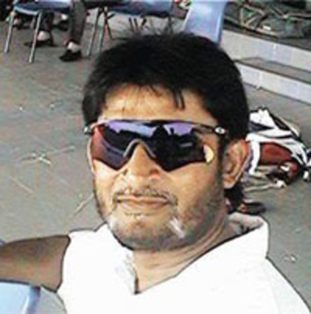 Utpal Chatterjee takes a break while batting | ESPNcricinfo.com