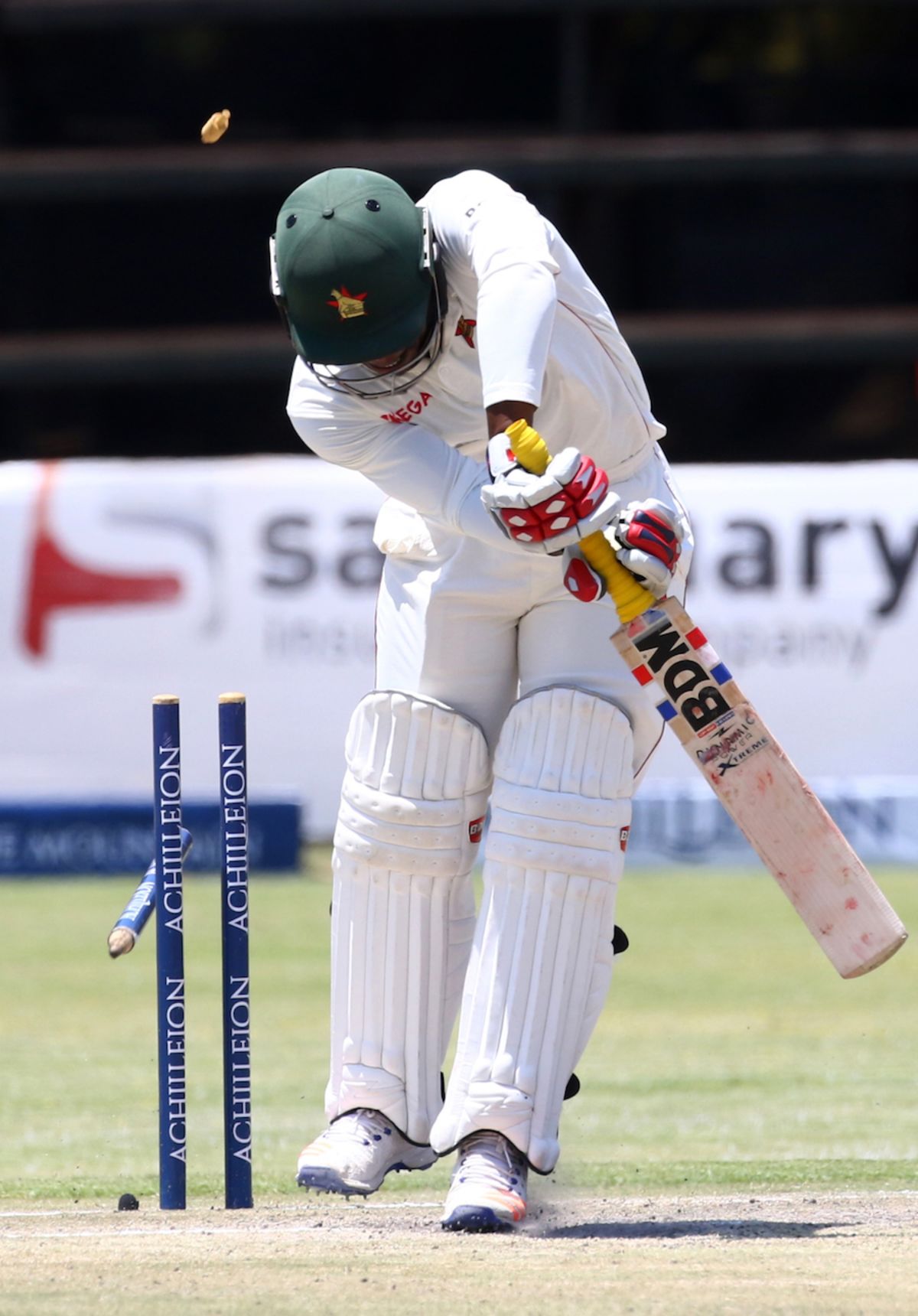 A wide-eyed Brian Chari attempts a scoop | ESPNcricinfo.com