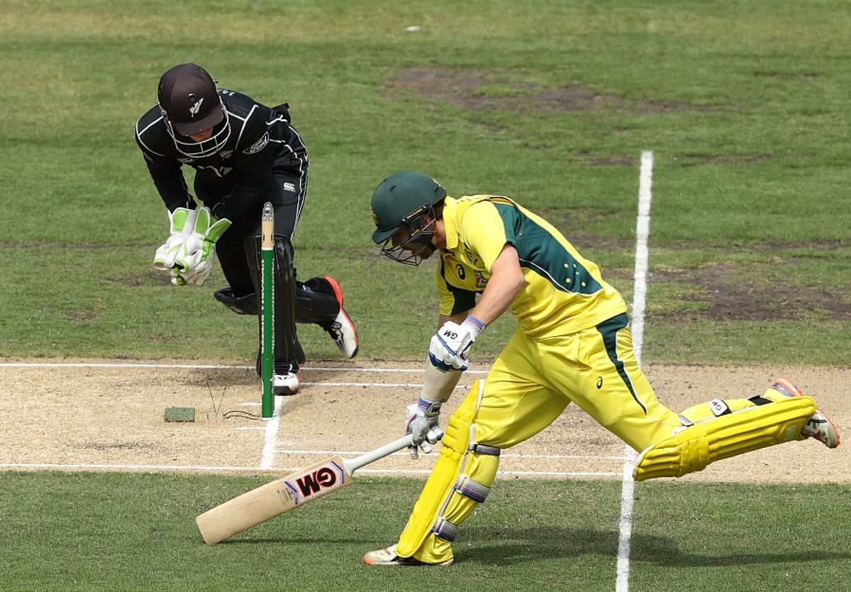 Travis Head scampers back to the crease even as BJ Watling prepares to ...
