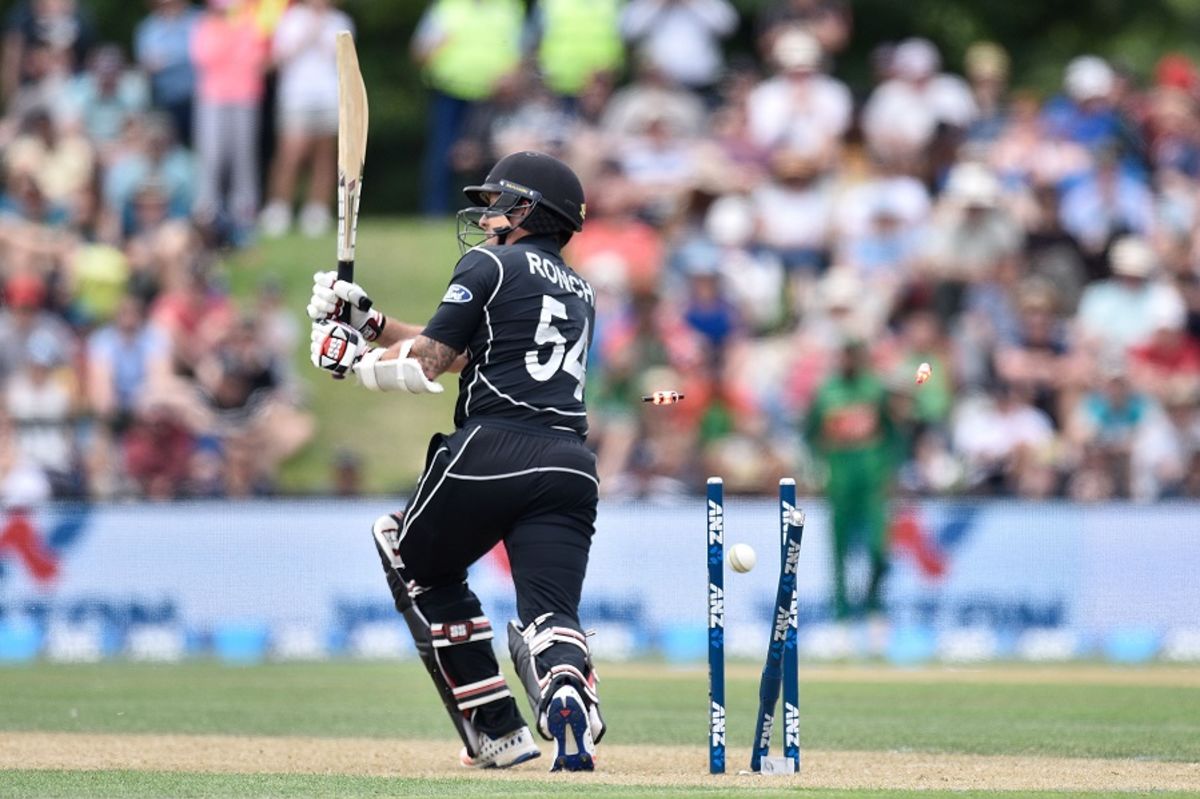Luke Ronchi loses his middle stump after missing a straight delivery ...
