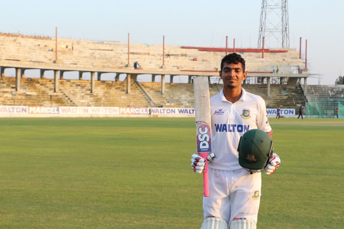 Saif Hassan poses at stumps after making 131 not out | ESPNcricinfo.com