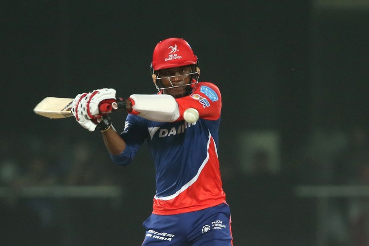 Marlon Samuels is a picture of concentration as he shapes up to pull ...