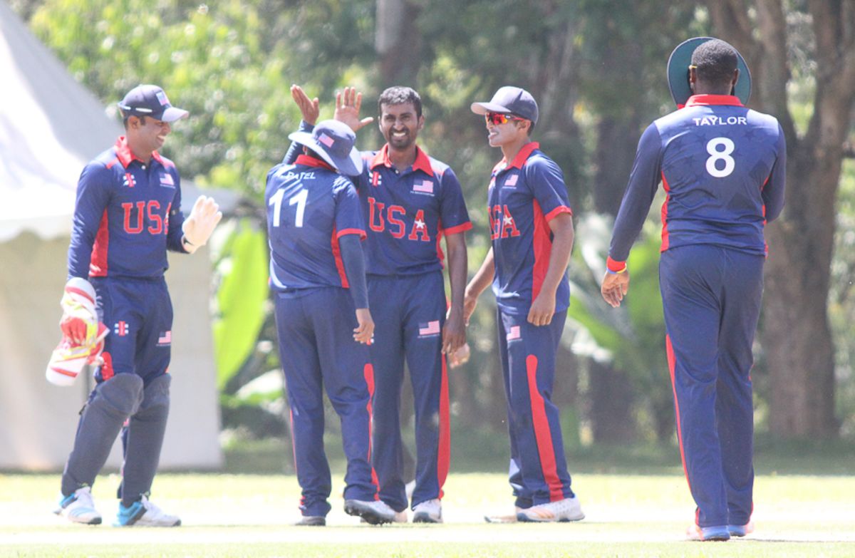 Mrunal Patel gets a high five after bowling Rizwan Cheema ...