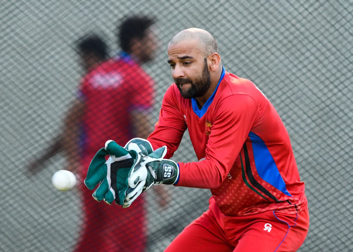 Shafiqullah hones his glovework during a training session ...