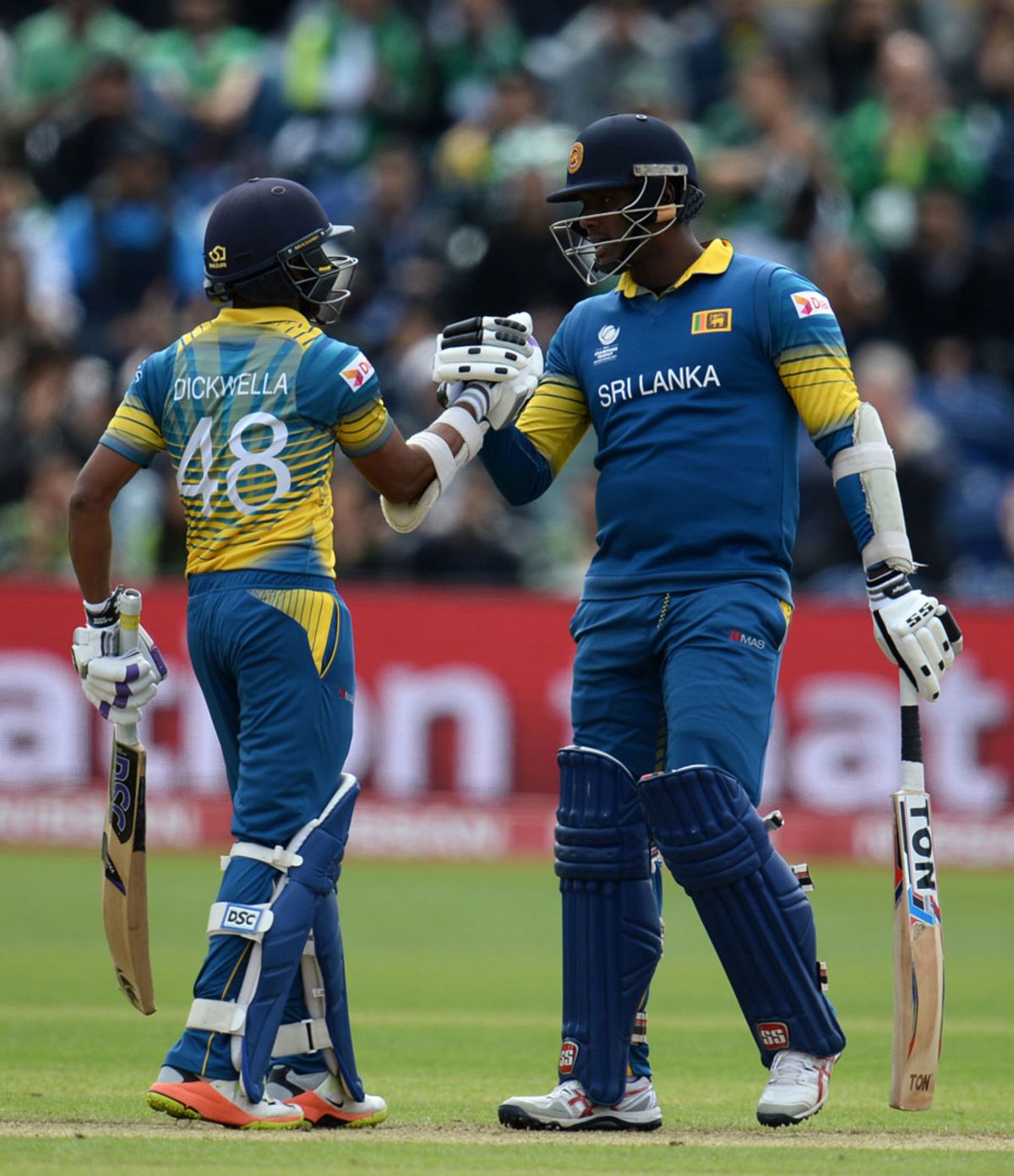 Angelo Mathews speaks to Niroshan Dickwella after the opener brings up ...