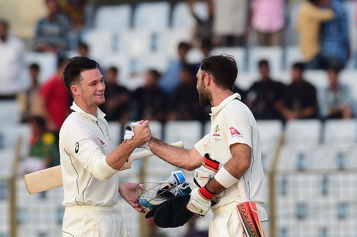 Peter Handscomb and Glenn Maxwell celebrate victory | ESPNcricinfo.com