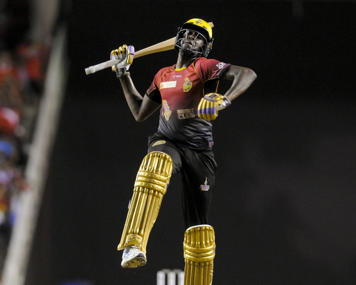 Trinbago Knight Riders players celebrate with the CPL trophy ...