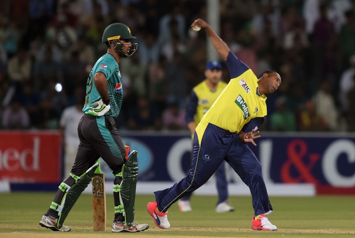 World XI's players get together to celebrate a wicket | ESPNcricinfo.com