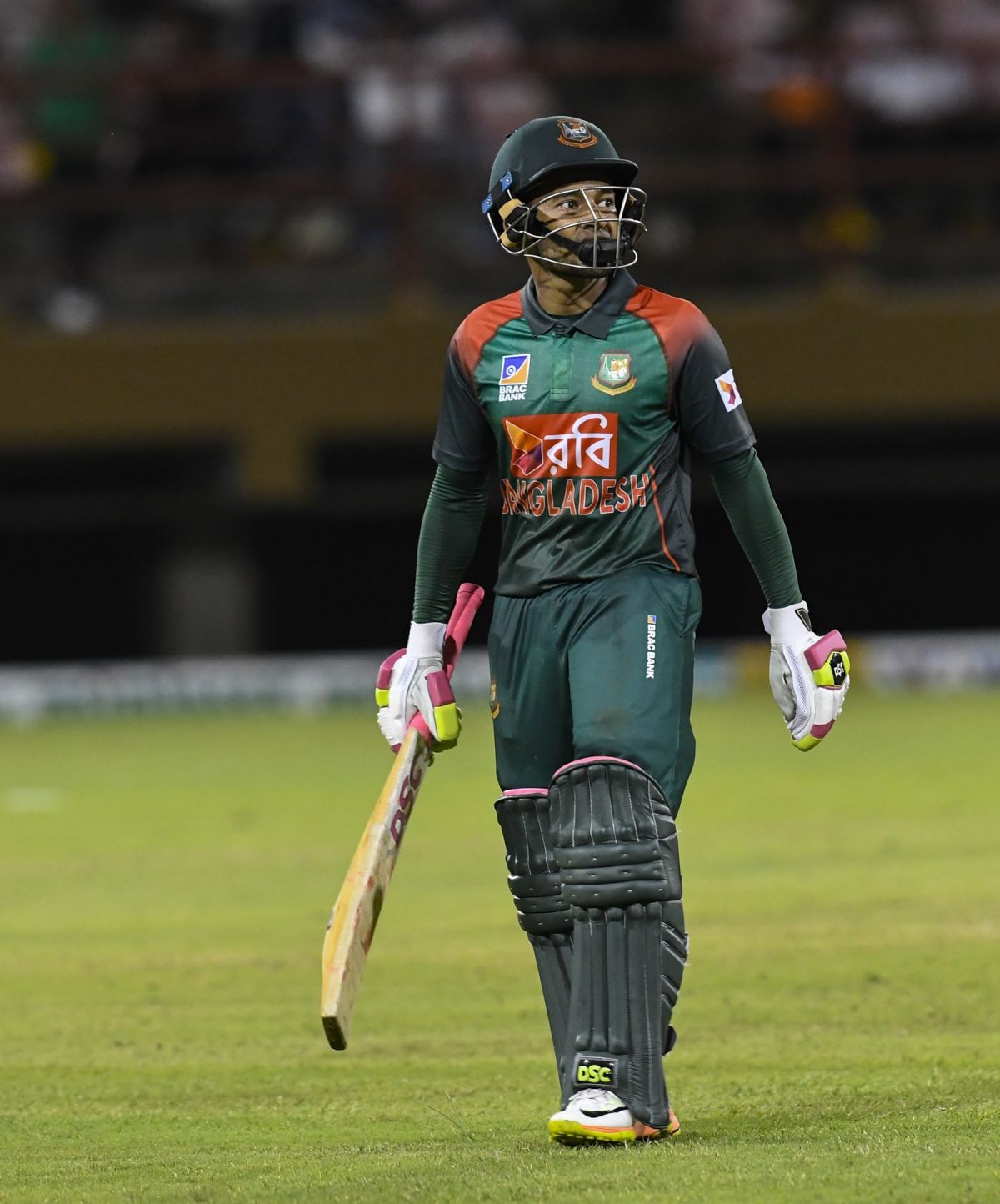 Samuel Badree is down on the ground as Liton Das and Mushfiqur Rahim ...