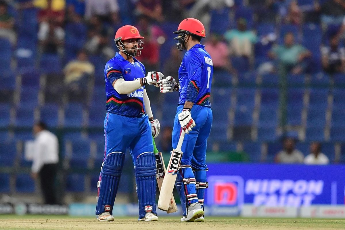 Mohammad Nabi and Samiullah Shenwari punch gloves | ESPNcricinfo.com Mohammad Nabi and Samiullah Shenwari punch gloves | ESPNcricinfo.com