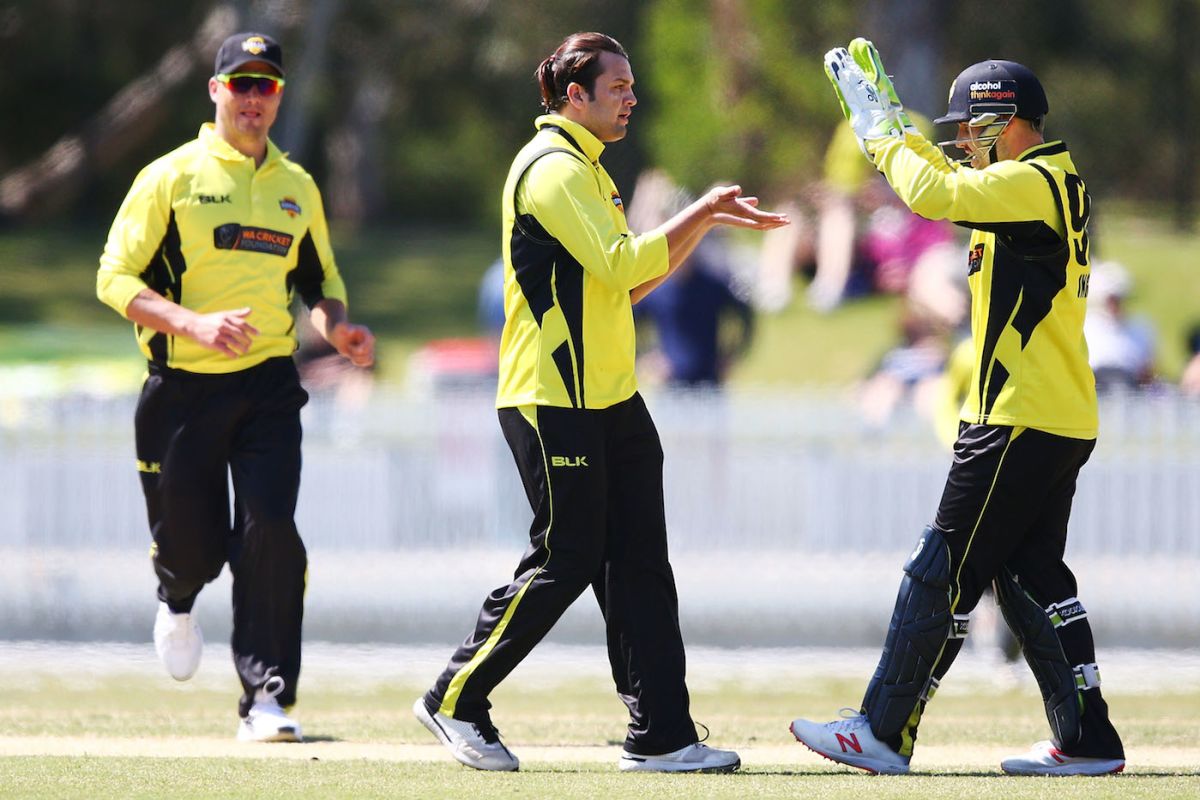 Usman Qadir Gets A High Five From His Team Mate