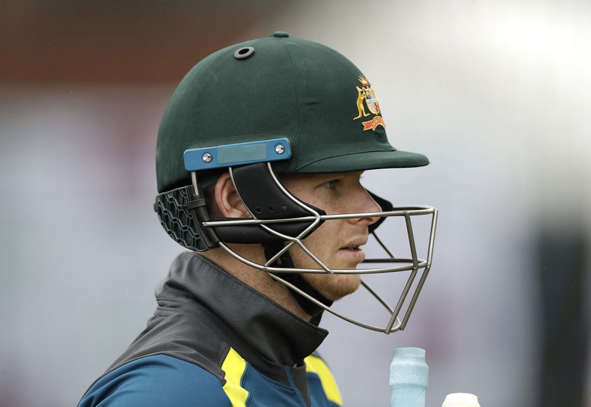 Steven Smith - wearing stem guards on his helmet - prepares for a net ...