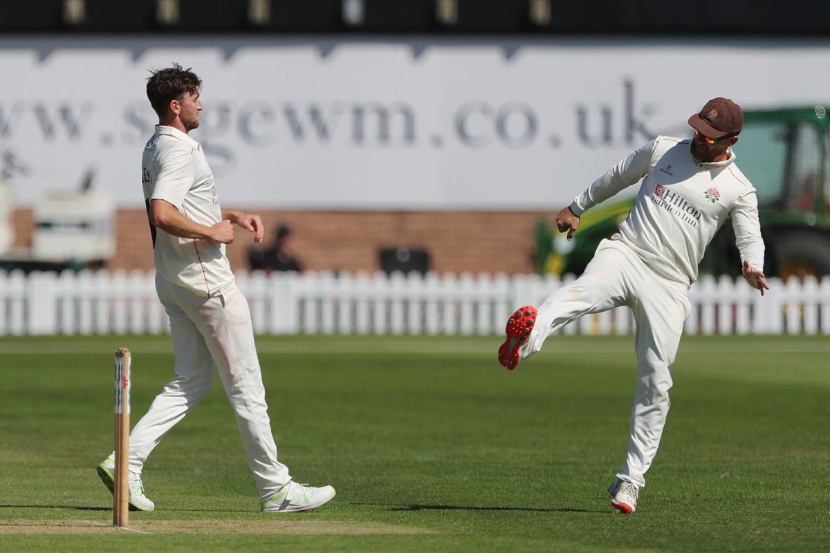 Richard Gleeson is offered a celebratory boot by Dane Vilas ...