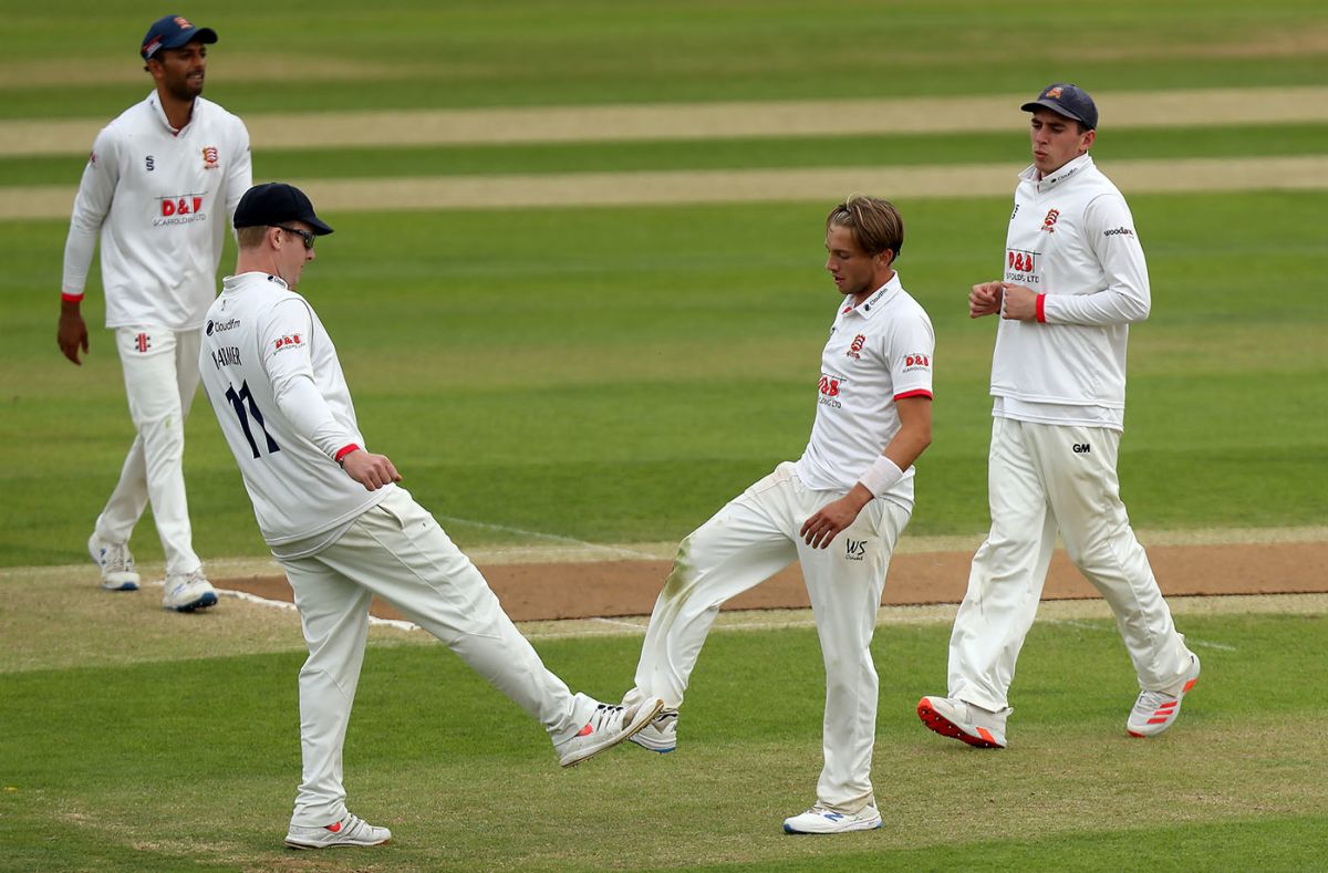 Aaron Beard gets a celebratory foot bump | ESPNcricinfo.com
