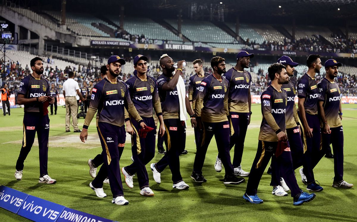 Kolkata Knight Riders' players walk around the ground greeting fans ...