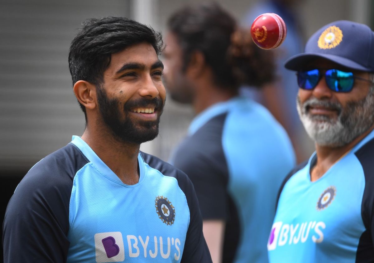 Jasprit Bumrah smiles as he tosses a new red ball | ESPNcricinfo.com