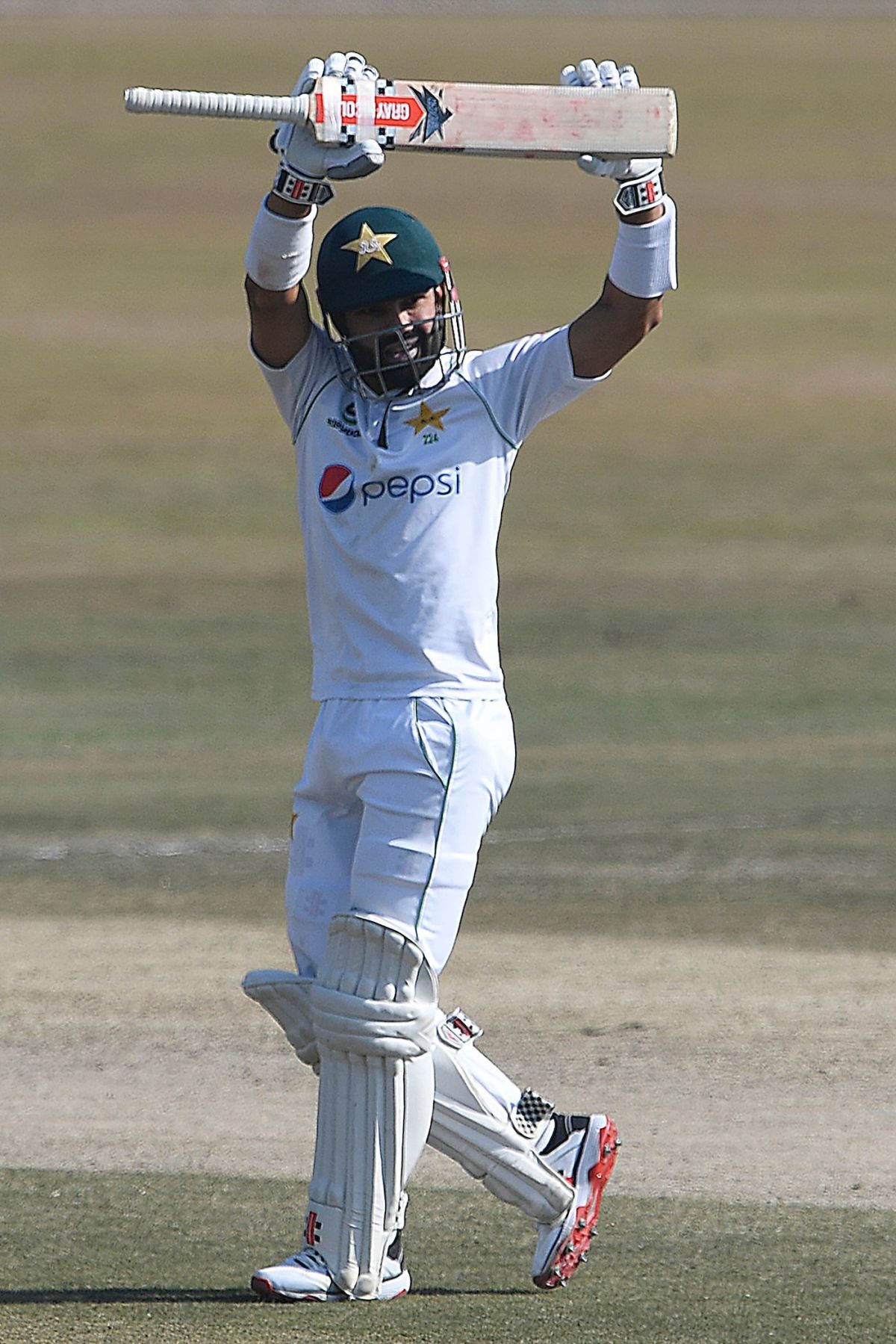 Mohammad Rizwan gestures to the dressing room after his half-century ...