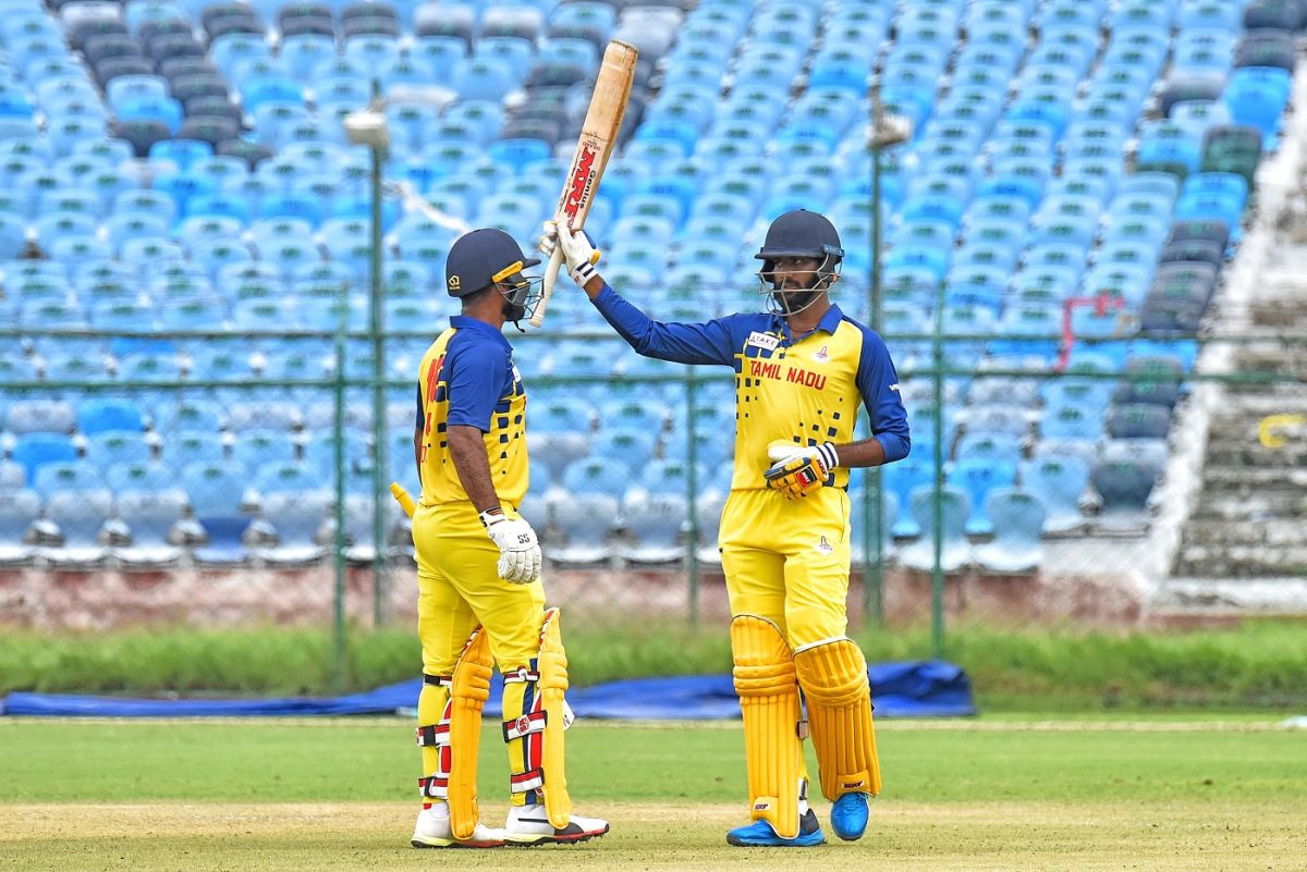 C Hari Nishaanth chips one down the ground as Nakul Verma looks on | ESPNcricinfo.com