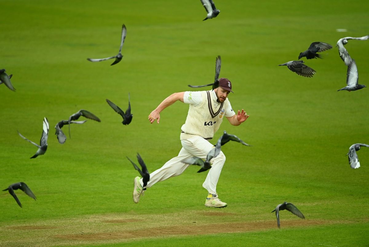 Martin Andersson celebrates with team-mate Ethan Bamber after taking ...