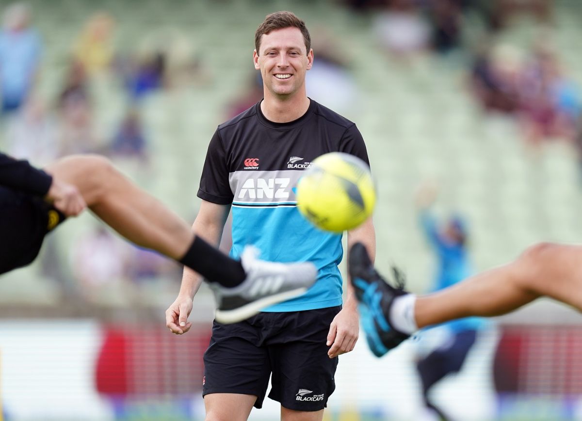 Matt Henry plays spectator as his team-mates play football ...