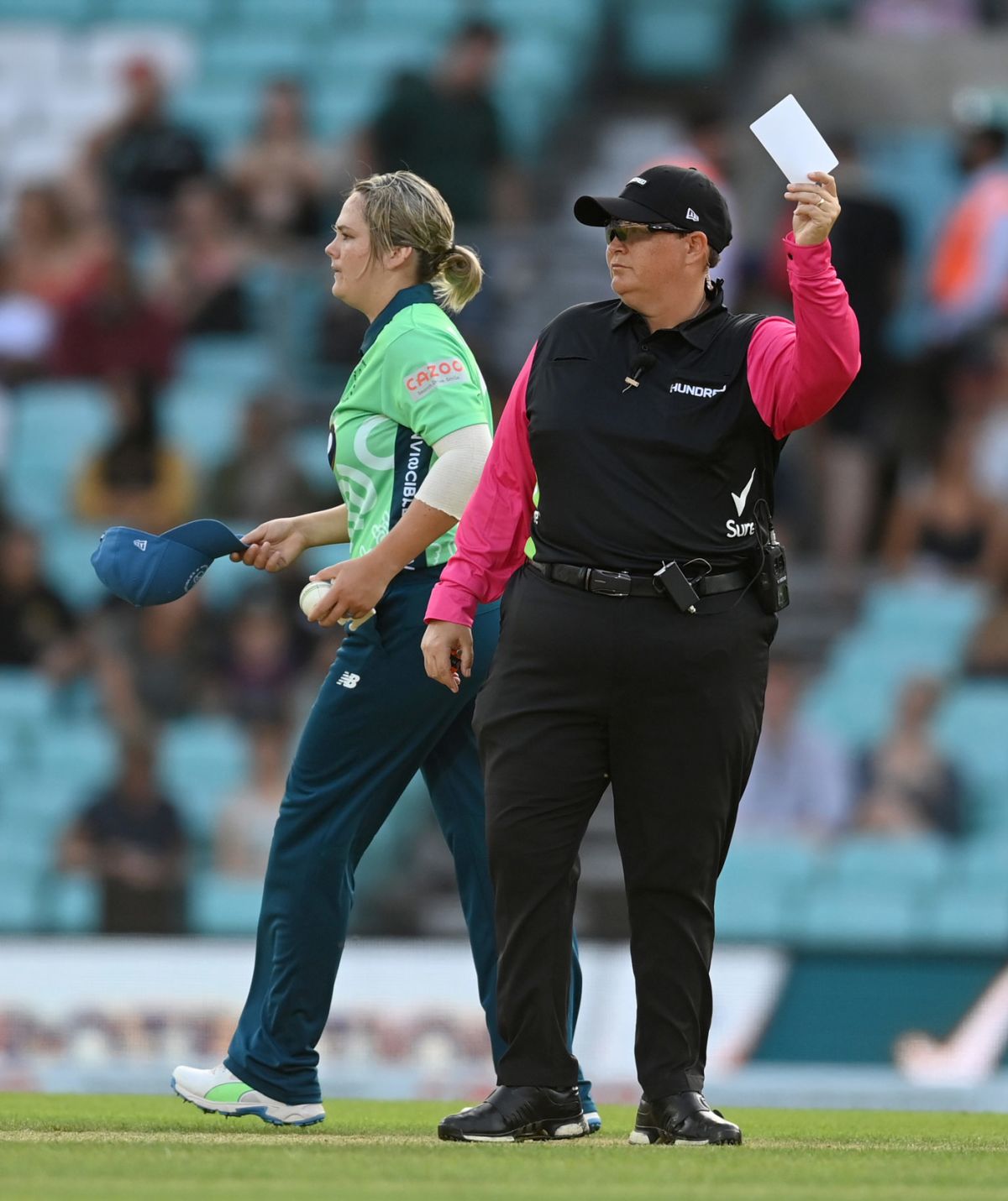 Umpire Sue Redfern makes a signal with the white card | ESPNcricinfo.com