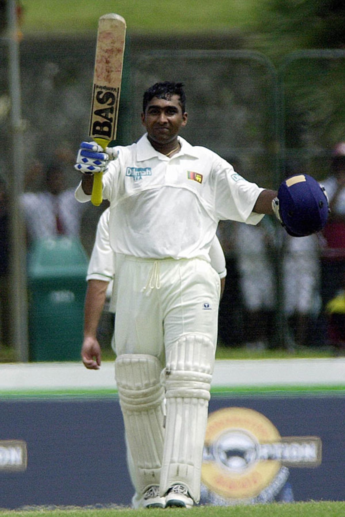 Mahela Jayawardene celebrates with Chaminda Vaas upon reaching his 200 ...