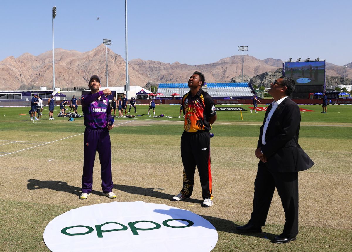 Kyle Coetzer flips the coin as Assad Vala looks on | ESPNcricinfo.com
