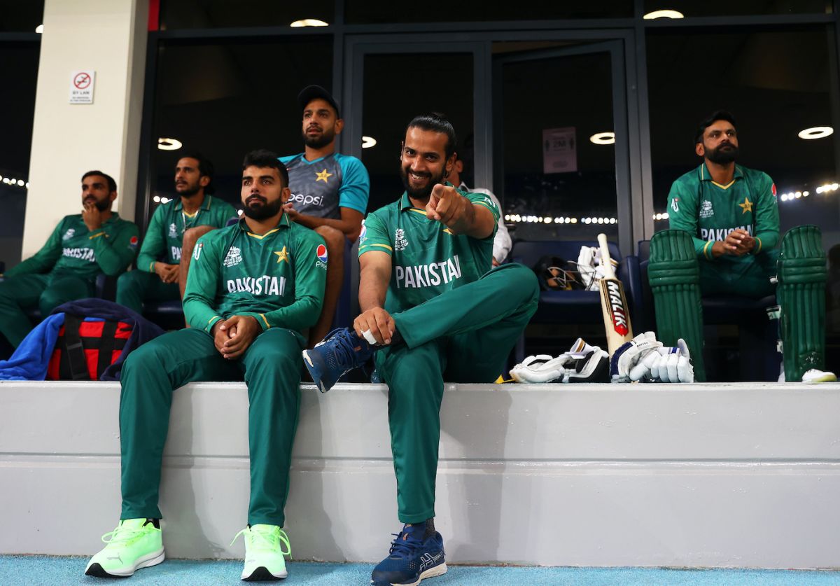 Mohammad Rizwan and Shoaib Malik have a look at the pitch ...