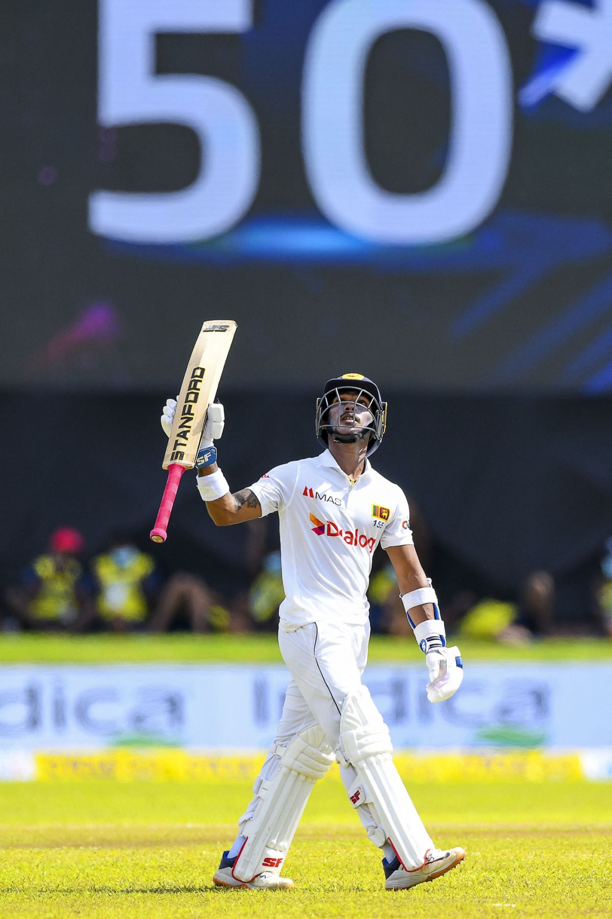 Pathum Nissanka raises his bat on getting to a fifty | ESPNcricinfo.com