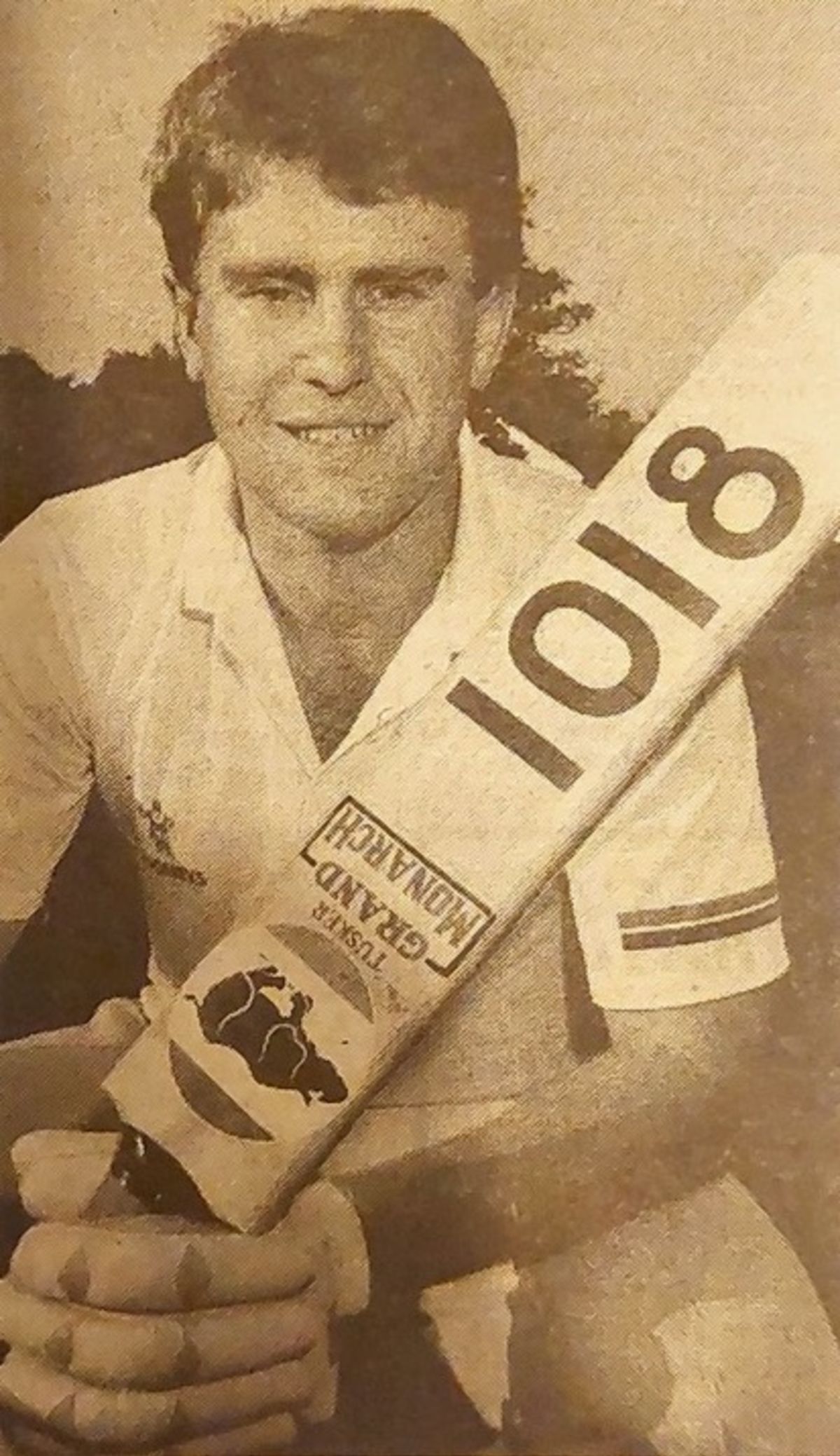 Mark Taylor holds up a bat with 1018 on it | ESPNcricinfo.com