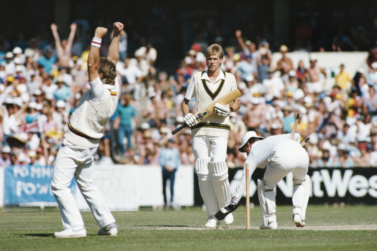 Elton John celebrates with Phil Edmonds and the England team at the MCG ...