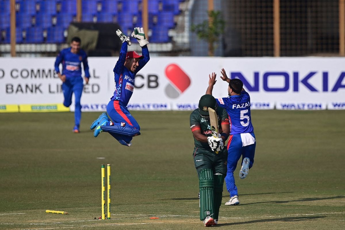 Rahmanullah Gurbaz and Fazalhaq Farooqi celebrate Yasir Ali's wicket | ESPNcricinfo.com