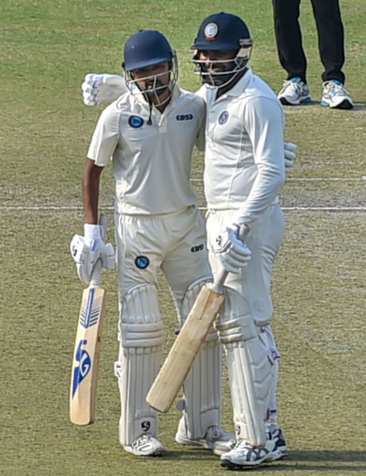 Rahul Shukla congratulates Shahbaz Nadeem after the latter brought up ...