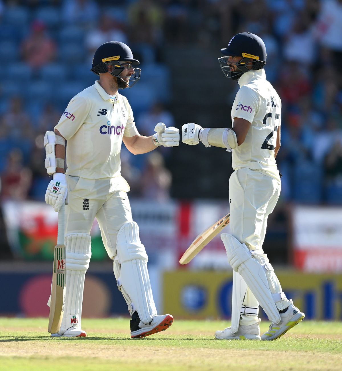 Jack Leach and Saqib Mahmood bump gloves during their last-wicket stand ...