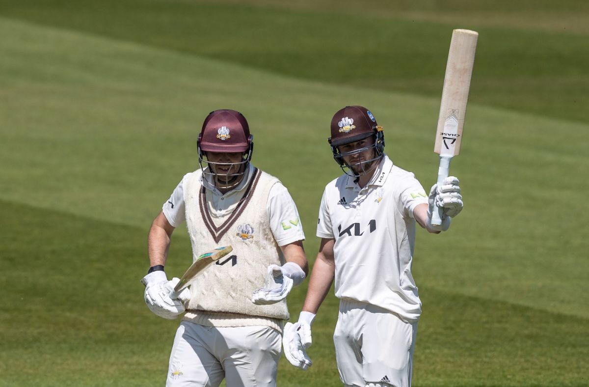 Gus Atkinson acknowledges the applause on reaching his maiden first ...
