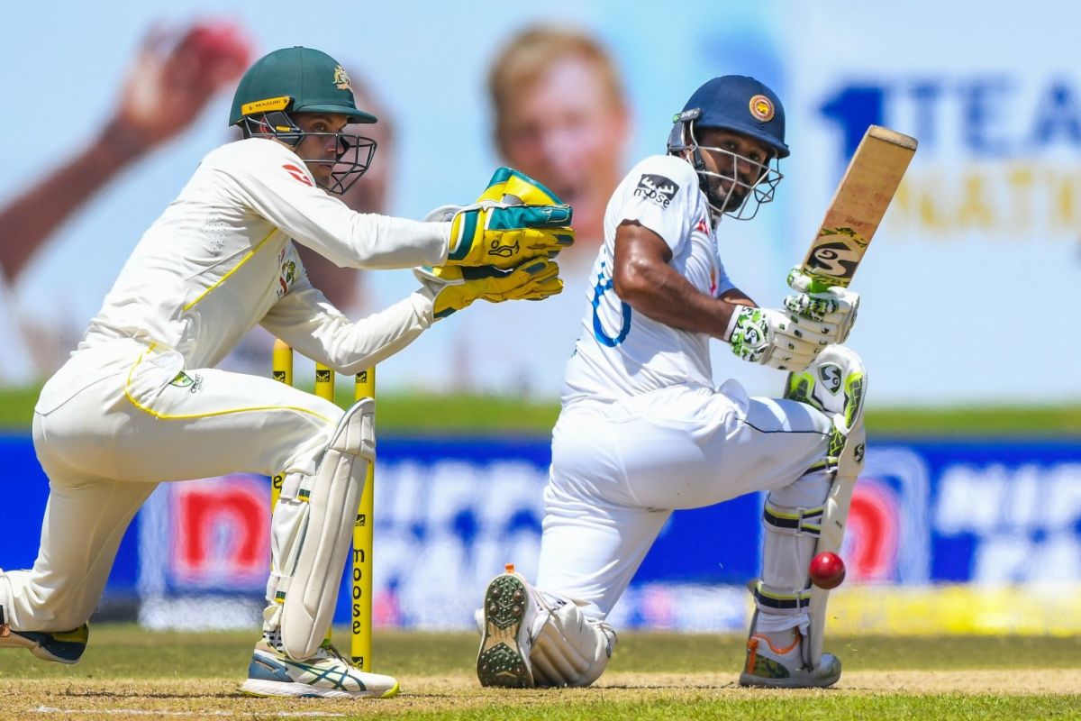 Dimuth Karunaratne laces the square cut on the first morning ...