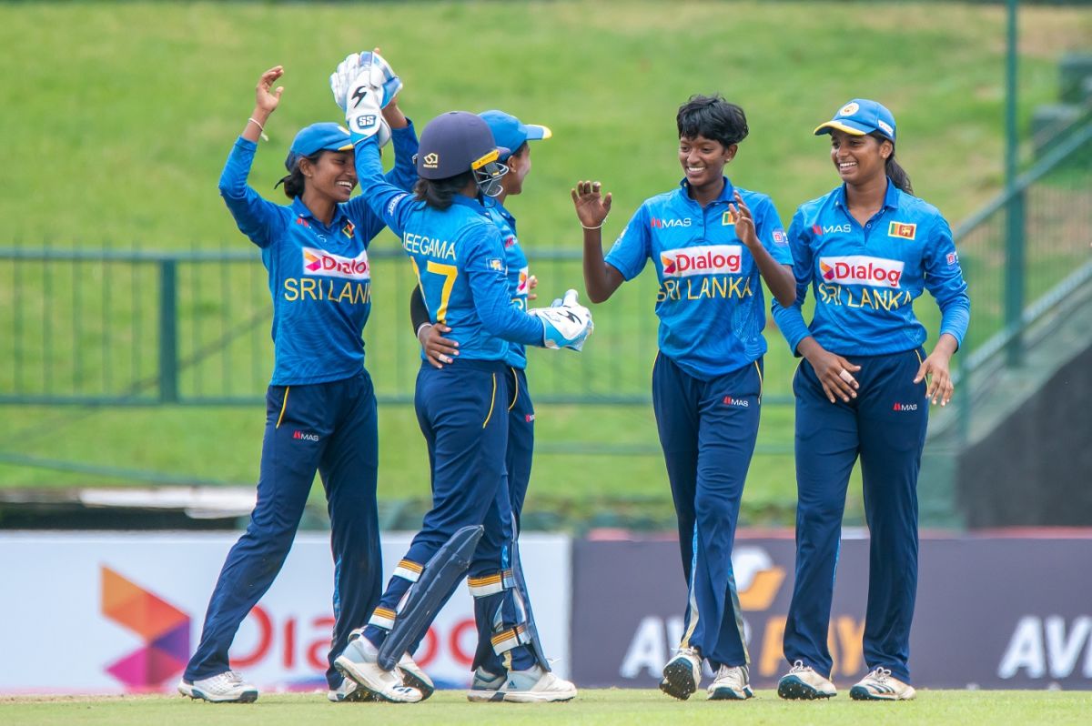 Kavisha Dilhari celebrates with team-mates the wicket of Smriti ...