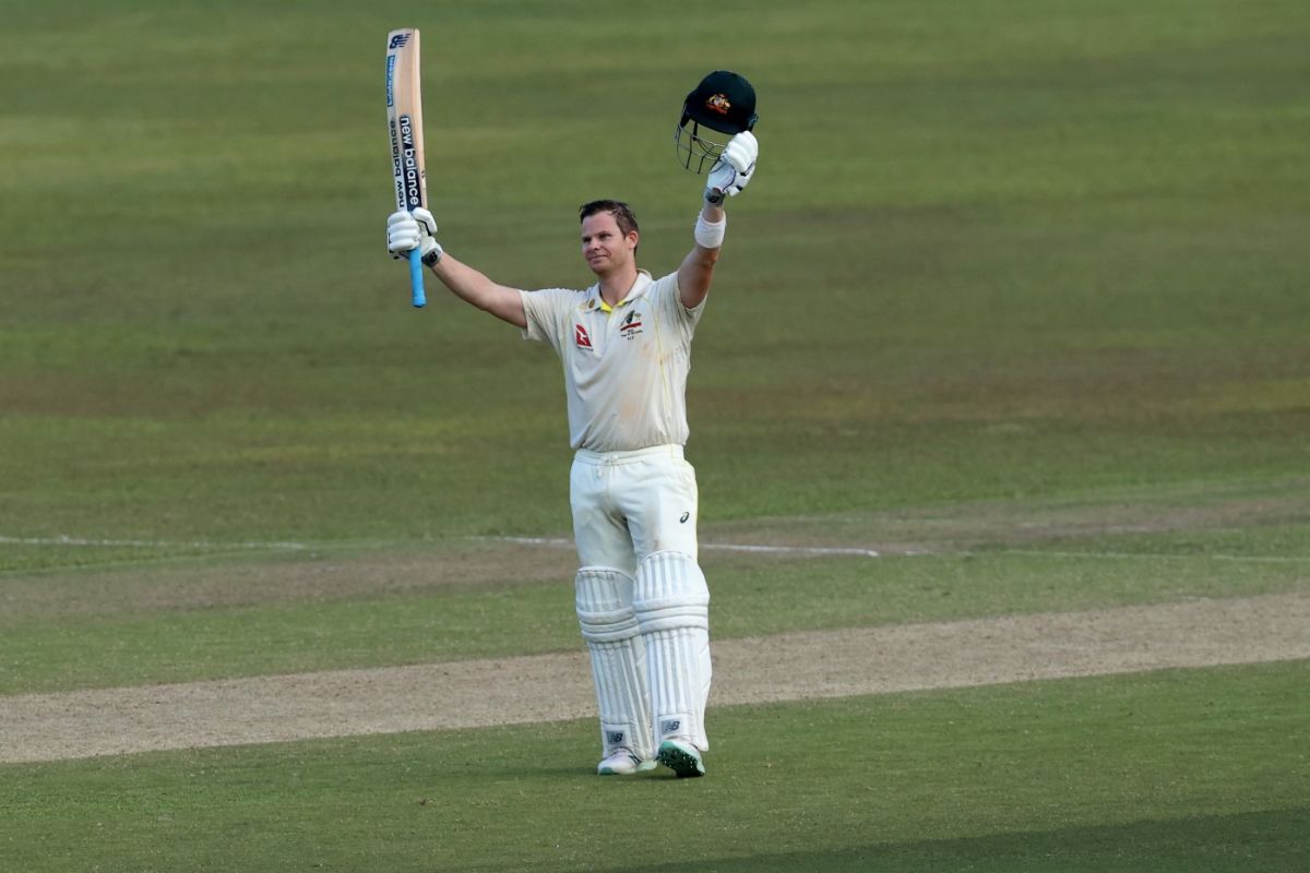 Steven Smith kisses his helmet after reaching a century | ESPNcricinfo.com