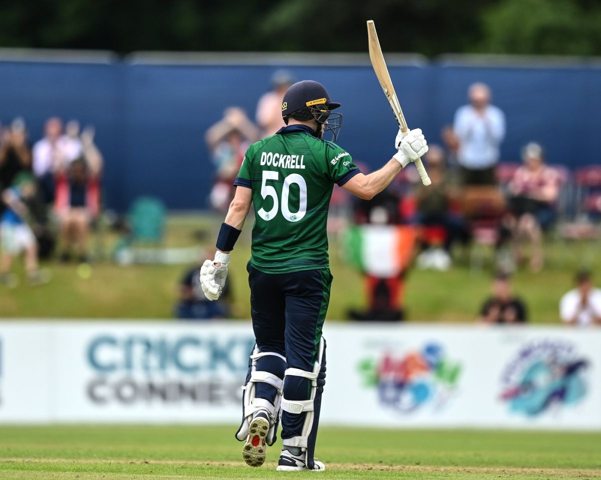 George Dockrell raises his bat after his half-century | ESPNcricinfo.com