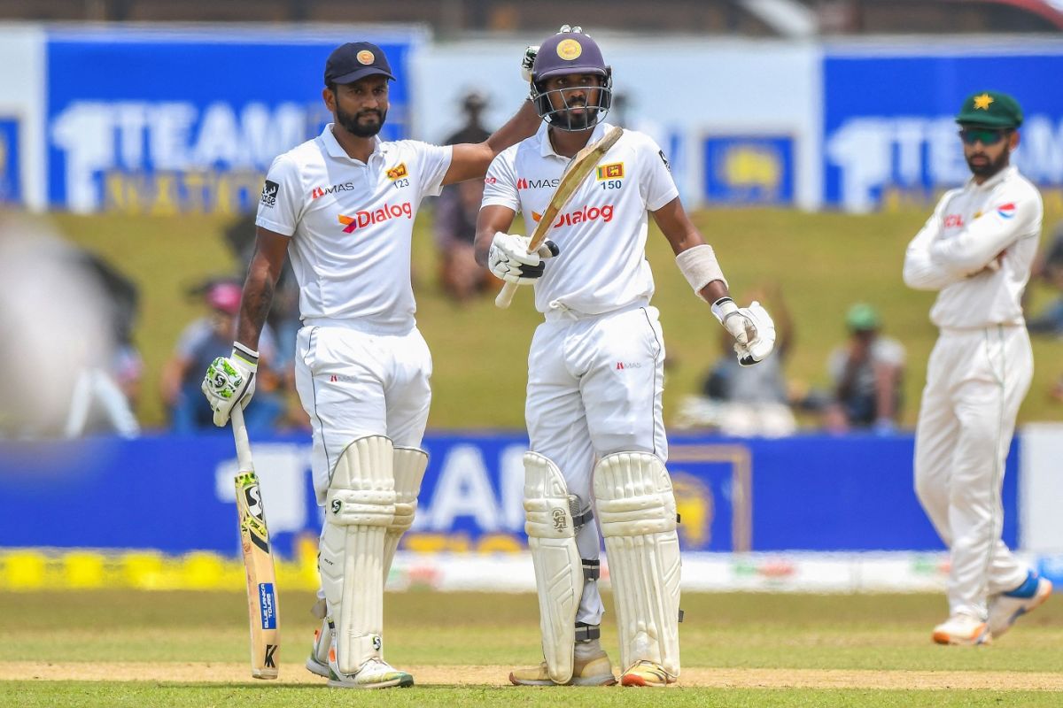 Oshada Fernando celebrates his fifty with Dimuth Karunaratne ...