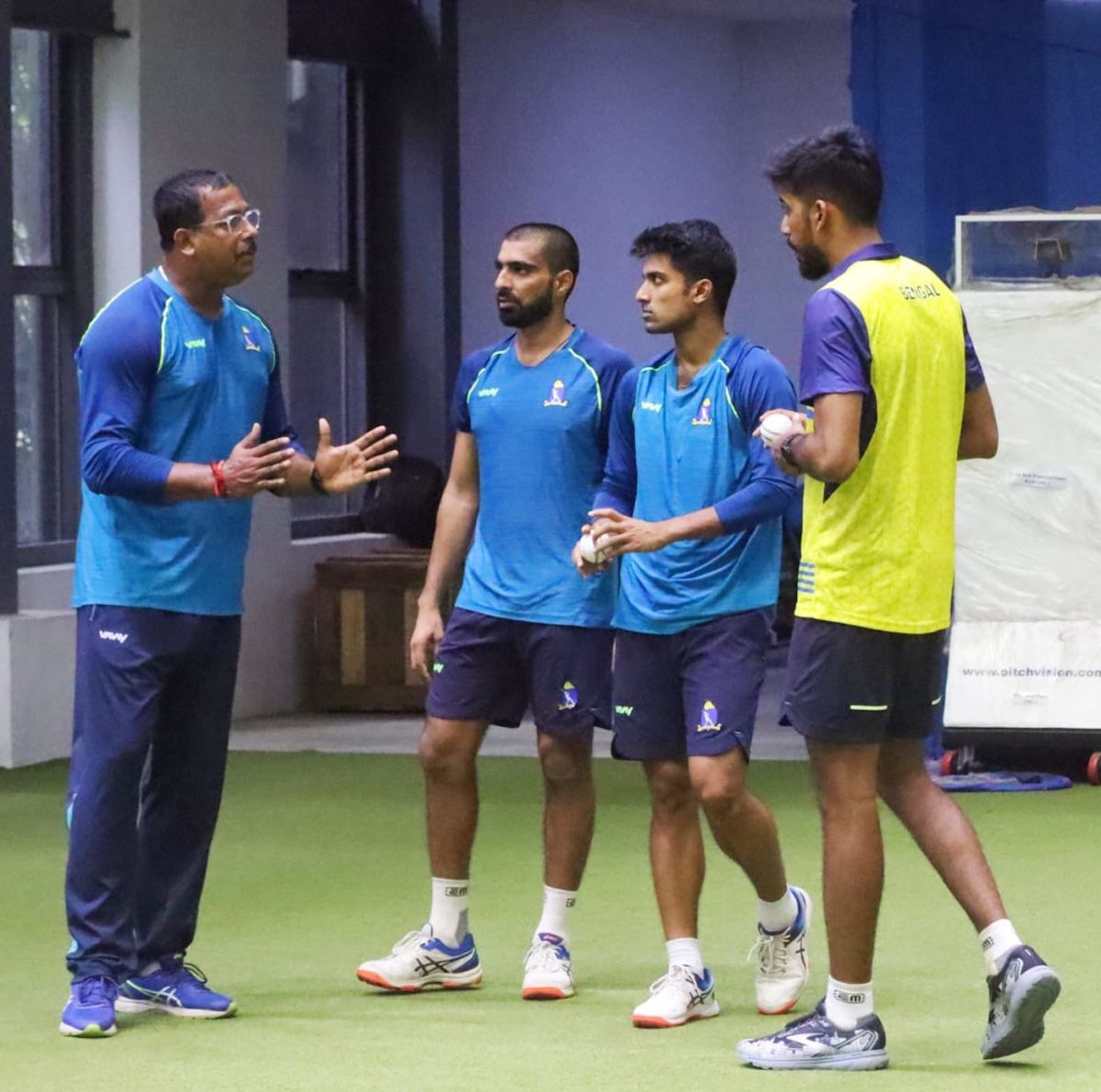 Shib shankar Paul (left) chats to Mohammed Kaif, Sayan Sekhar Mondal ...