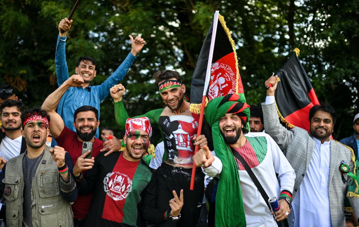 Vibrant Afghanistan fans express their joy during the game at Stormont ...