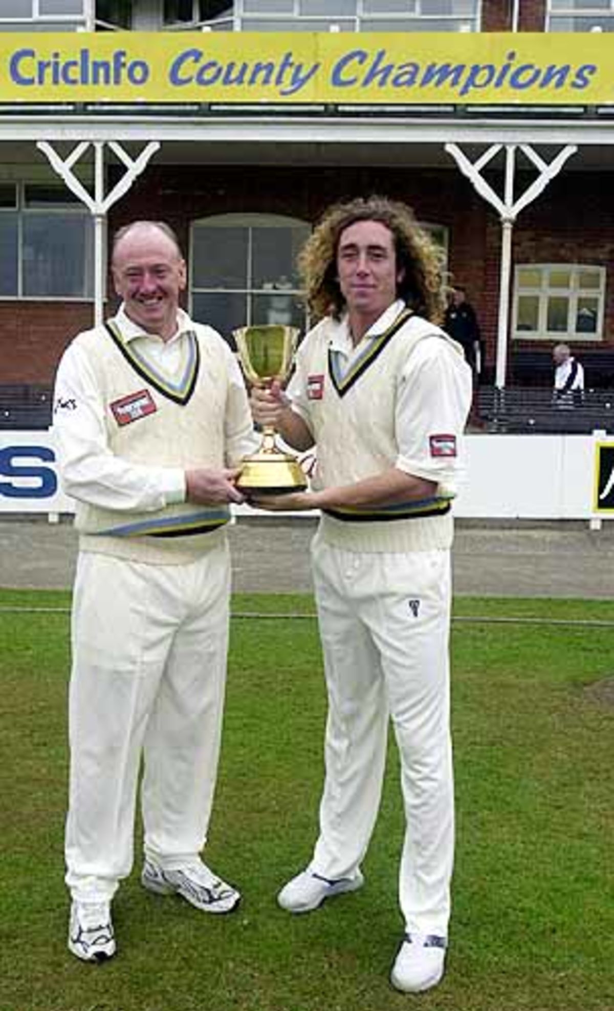 Arnie and Ryan Sidebottom celebrating the CricInfo Championship success ...