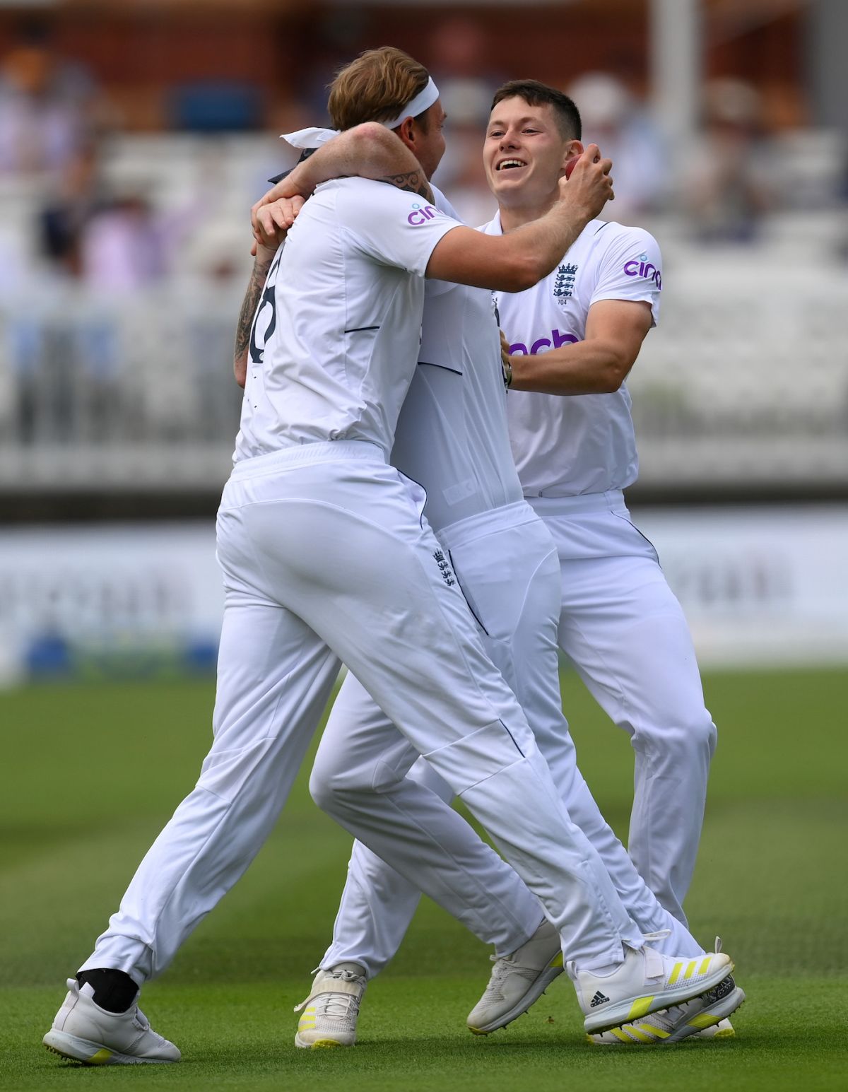 Stuart Broad is mobbed by his team-mates after pulling off a stunning ...