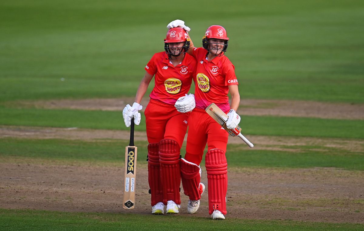Lauren Filer gets a pat on the helmet from Annabel Sutherland ...