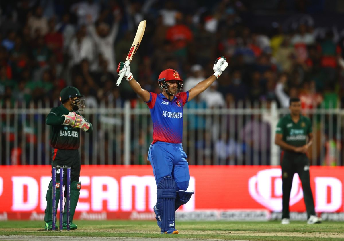 Najibullah Zadran raises his arms in triumph | ESPNcricinfo.com